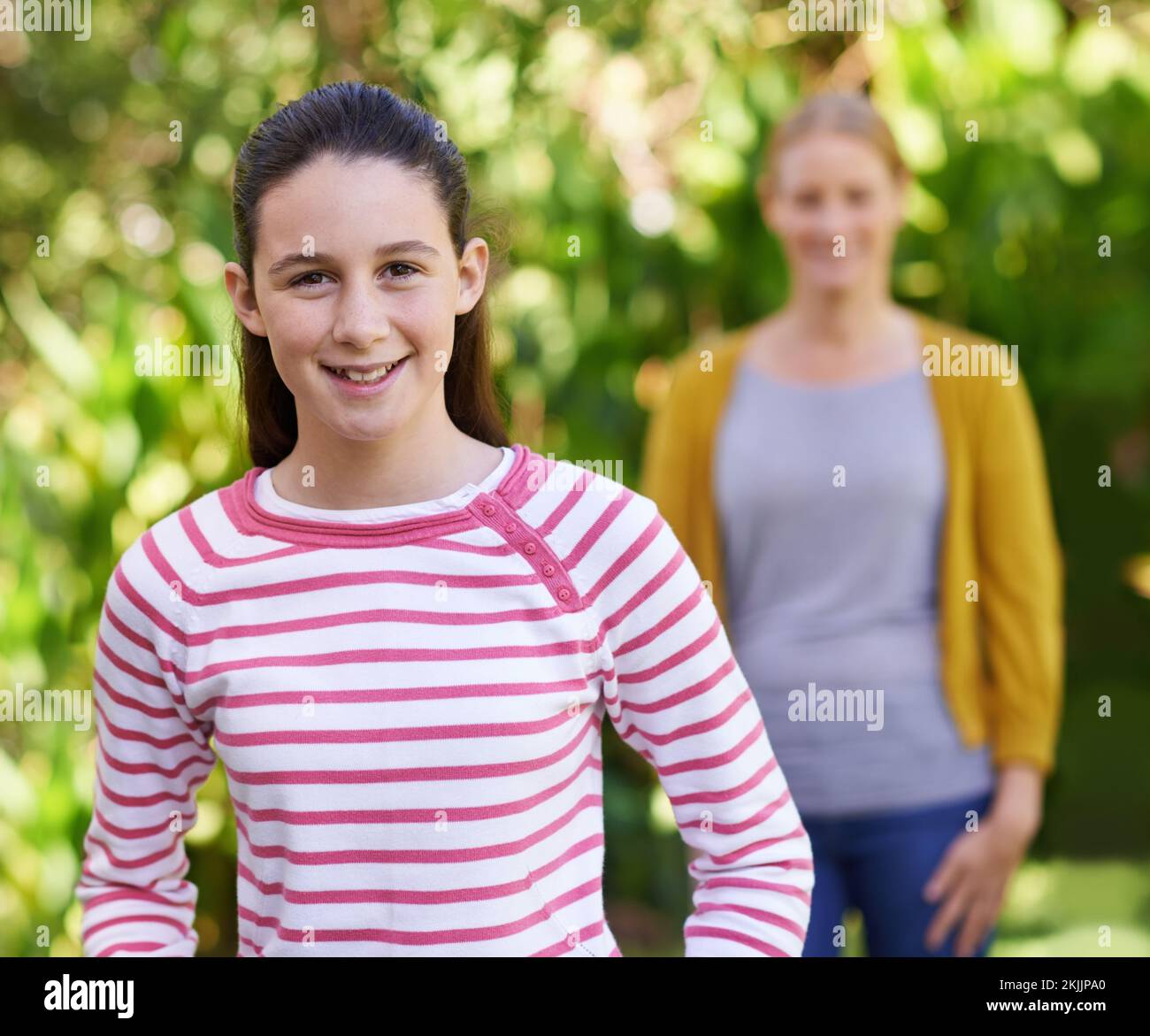 Shes growing up to be a wonderful woman. a teenage girl standing ...
