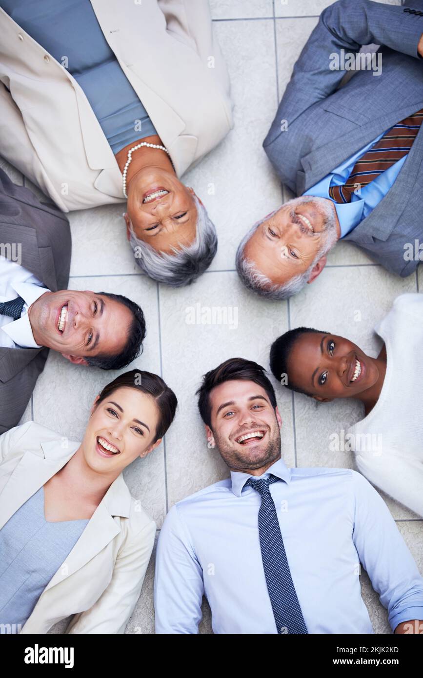 Circle of colleagues and friends. High angle portrait of a group of ...