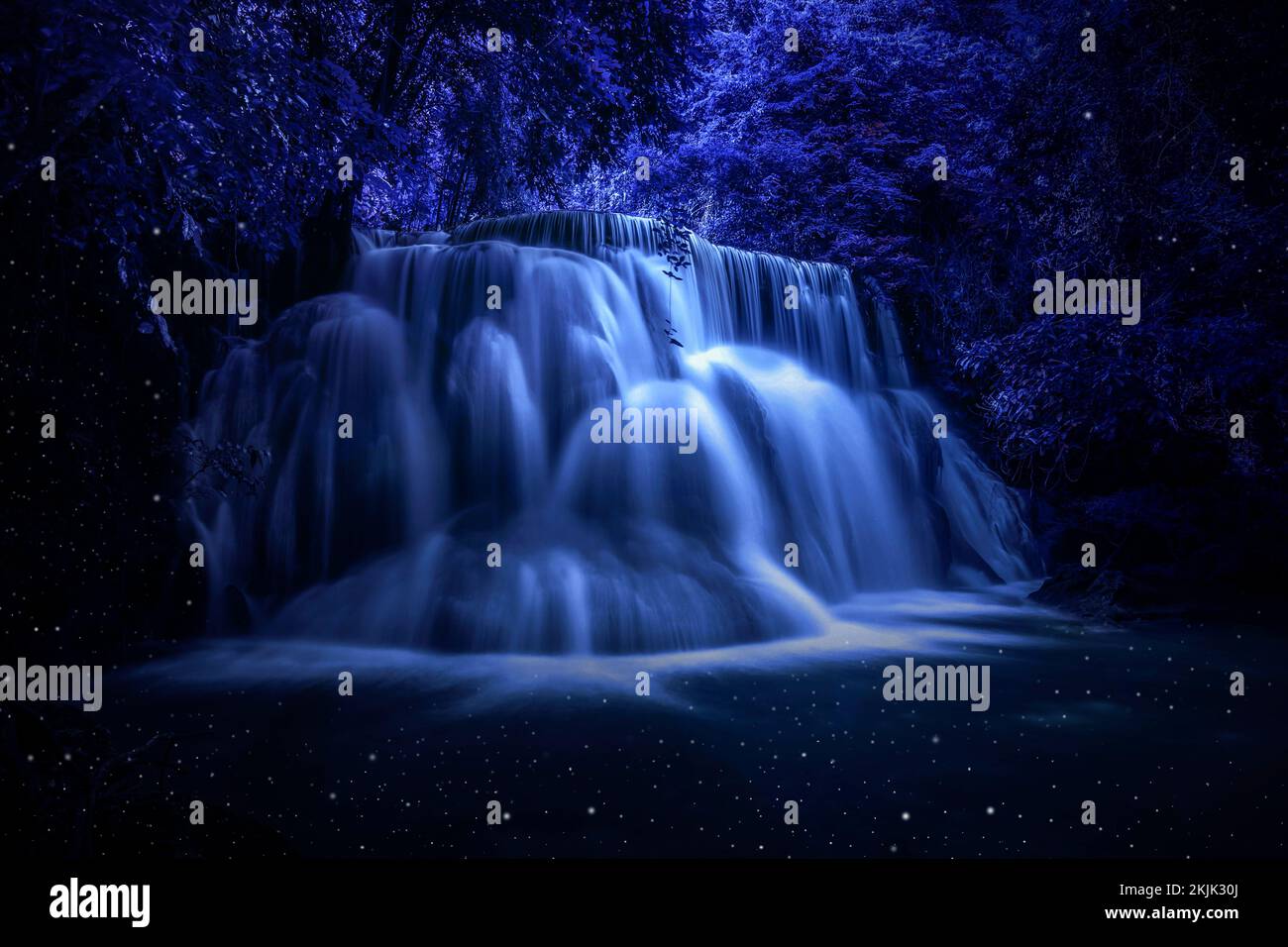 Beautiful waterfall nature scenery of colorful at a night deep tropical ...