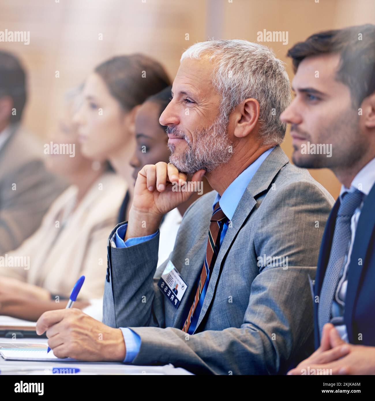 Business people sitting conference table hi-res stock photography and ...