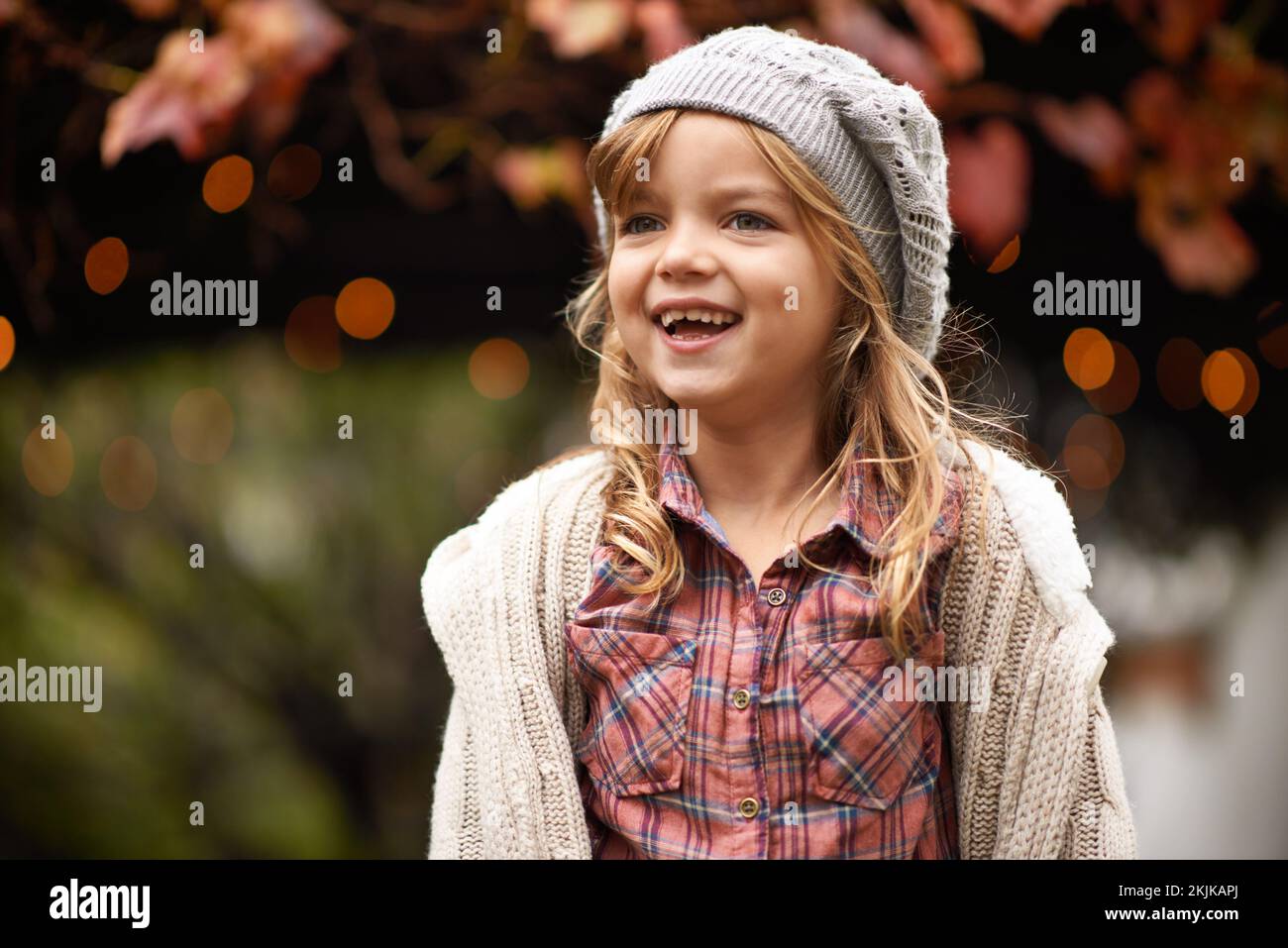 To see the world through the eyes of a child. a cute little girl ...