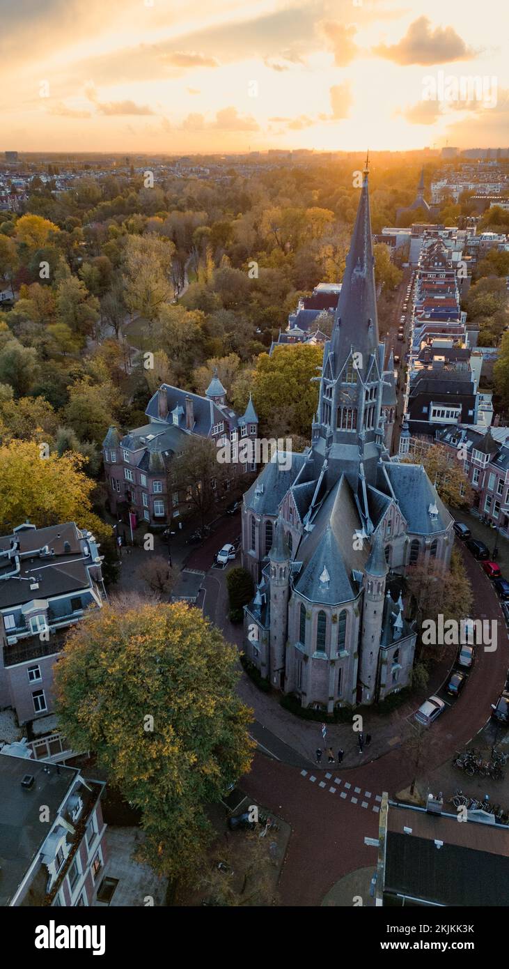 Vondel church, Catholic Church in Amsterdam and Vondel park sunset ...