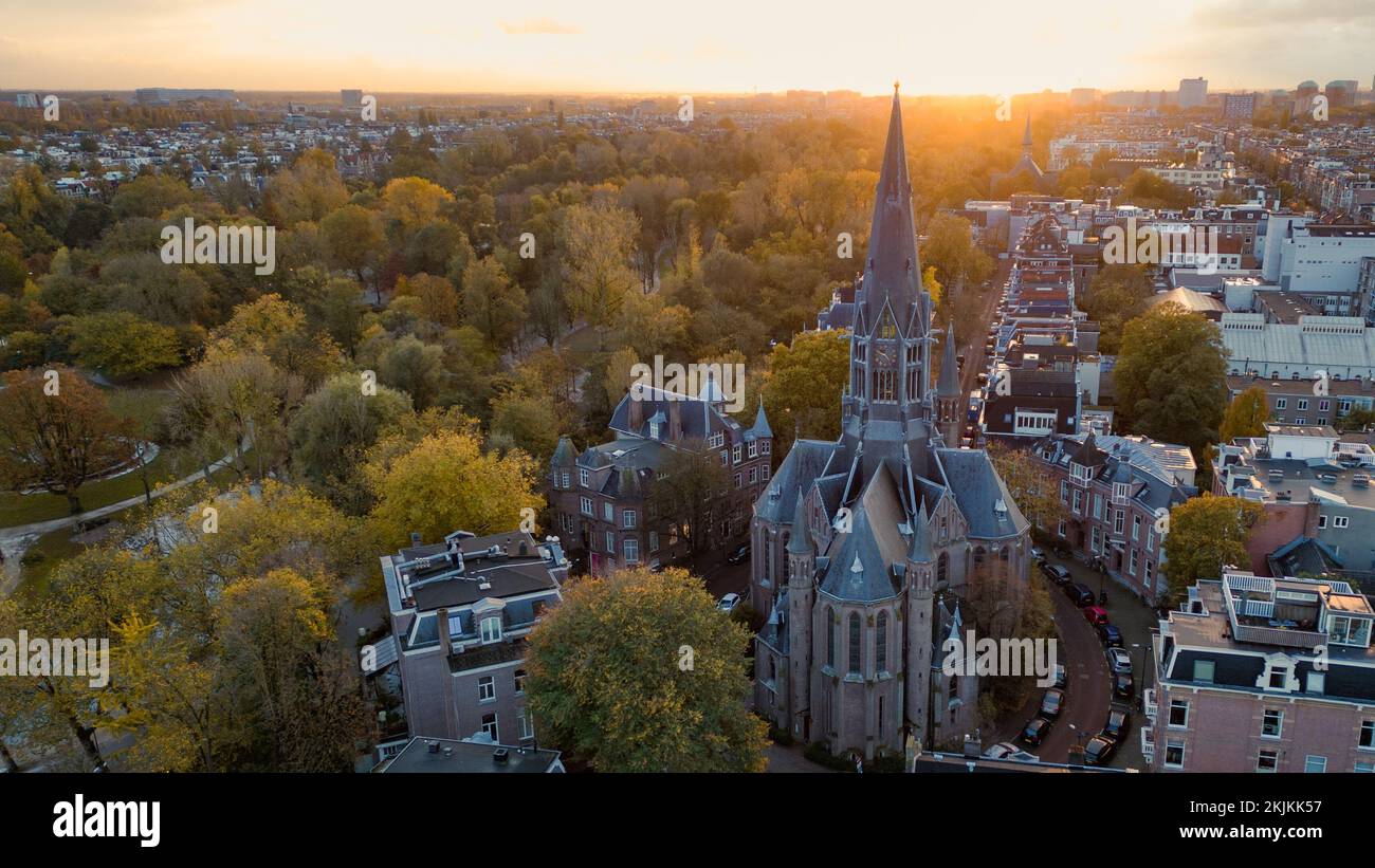 Vondel church, Catholic Church in Amsterdam and Vondel park sunset ...