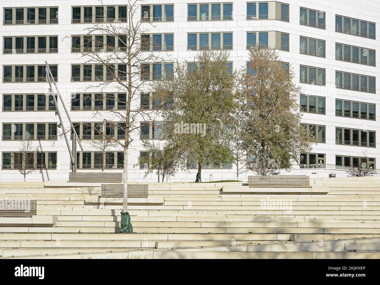 Modern office building, window front, steps in the foreground ...