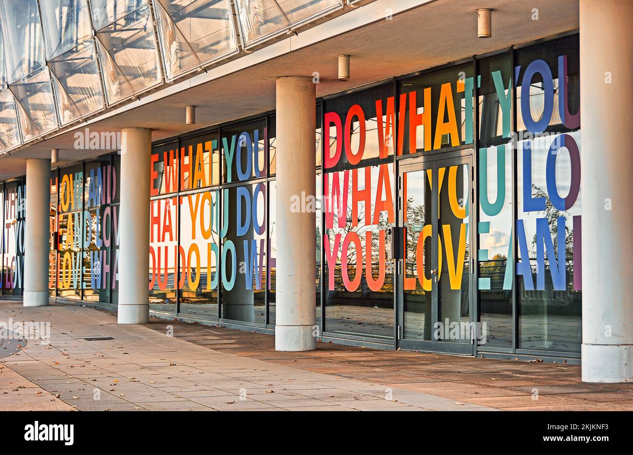 Colourful letters on a window front, white columns, Hafencity, Hamburg ...