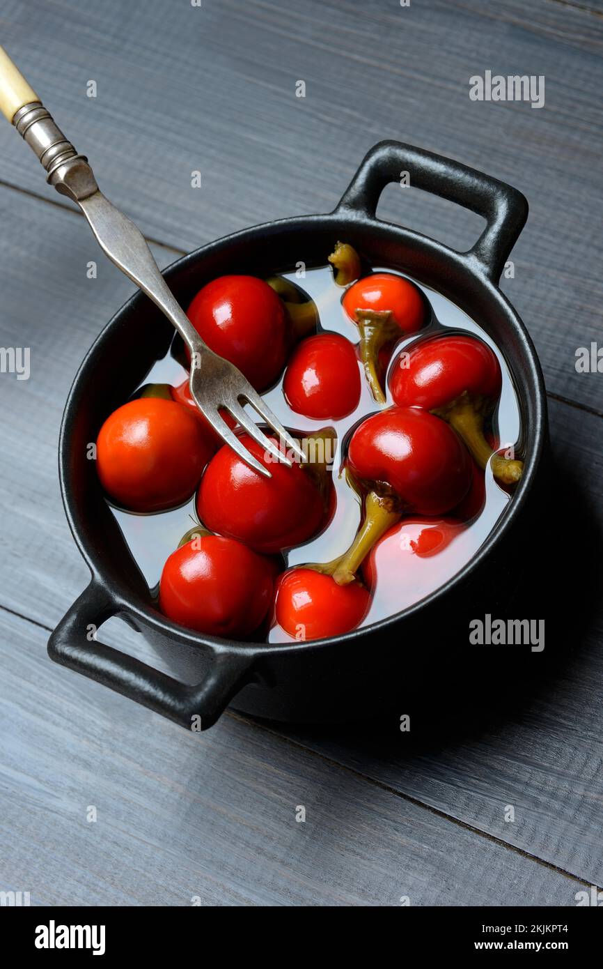 Potted cherry peppers in vinegar, chilli, paprika Stock Photo - Alamy