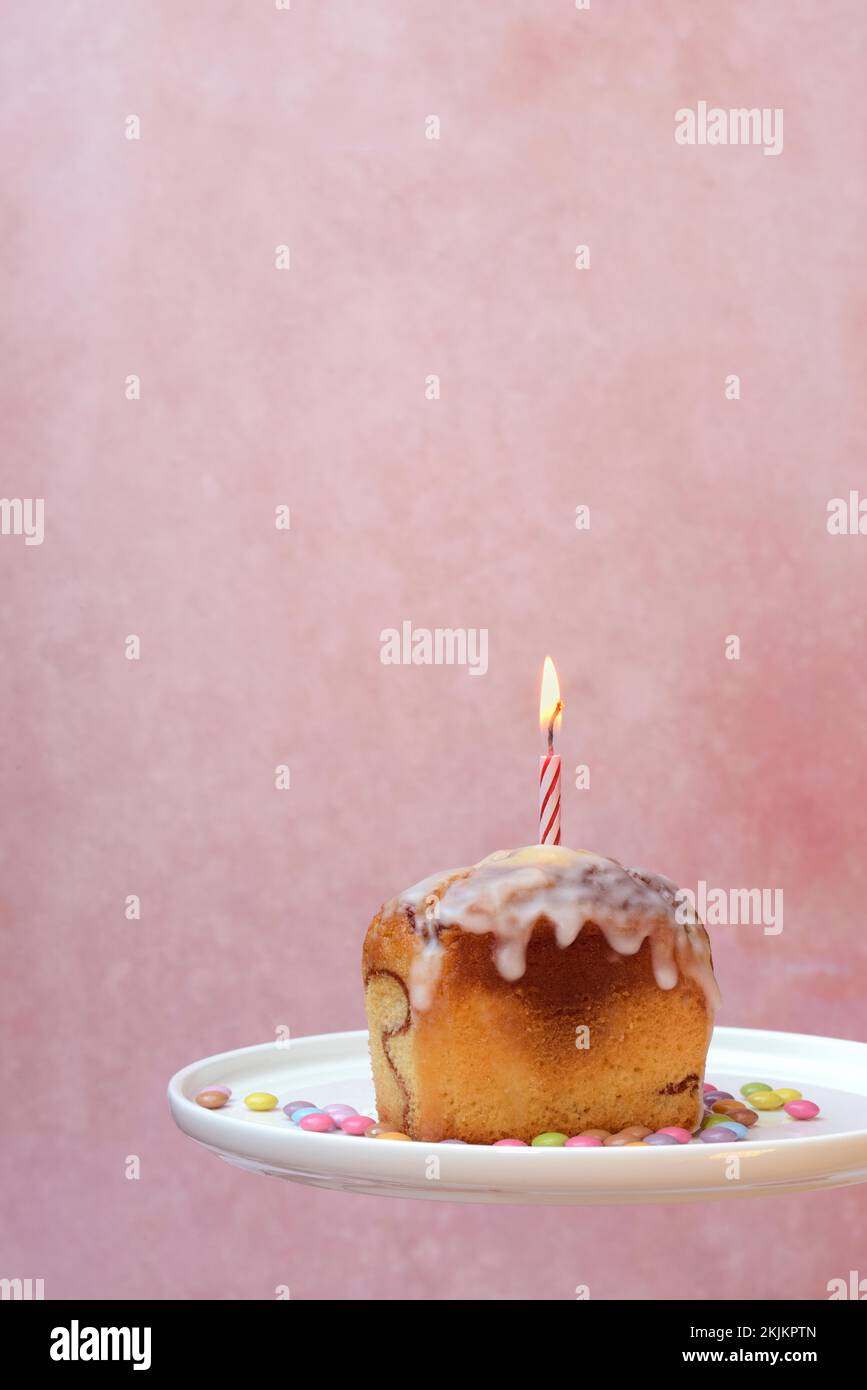 Birthday Cake with Burning Candle, Cake Stock Photo - Alamy