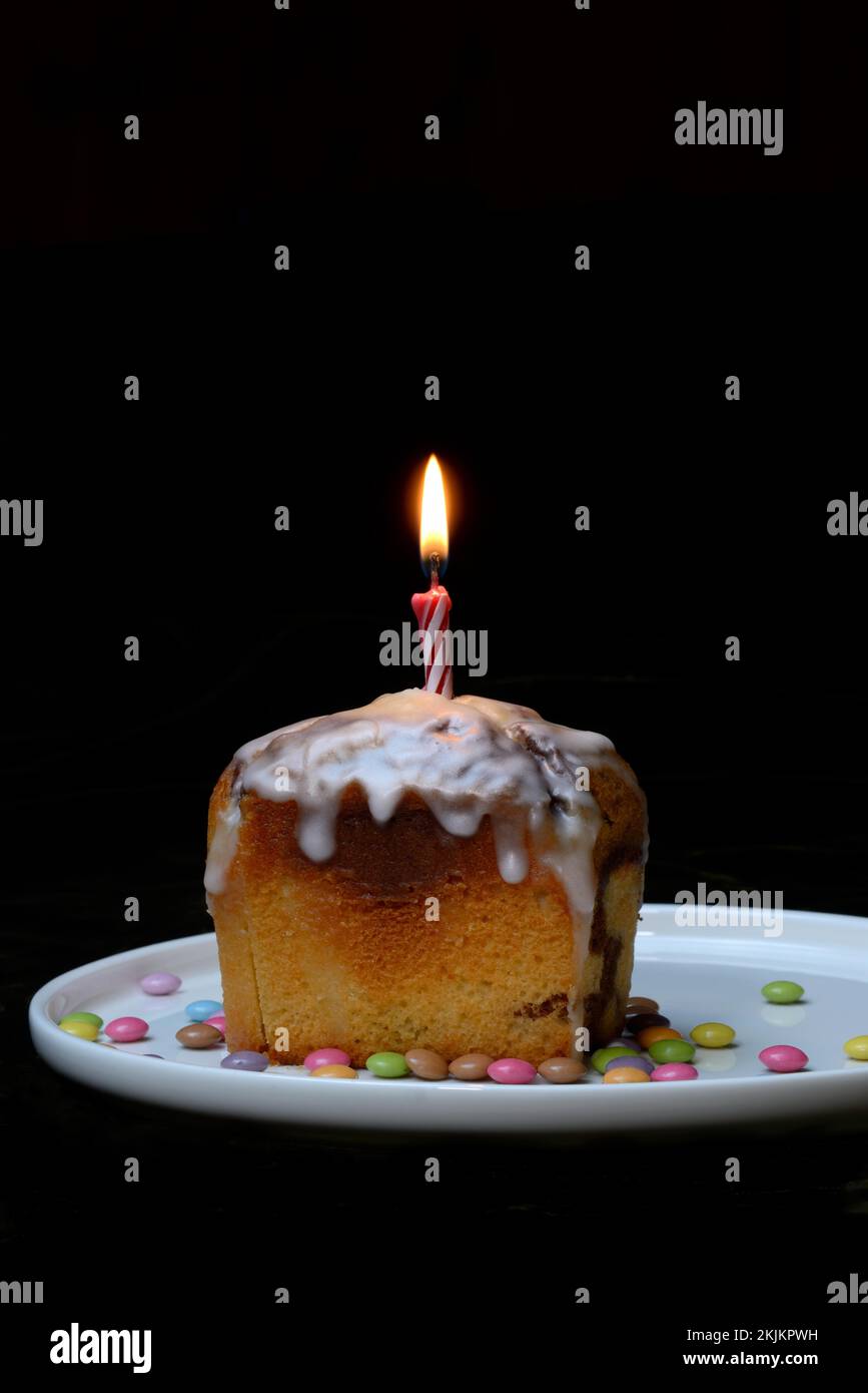 Birthday Cake with Burning Candle, Cake Stock Photo - Alamy