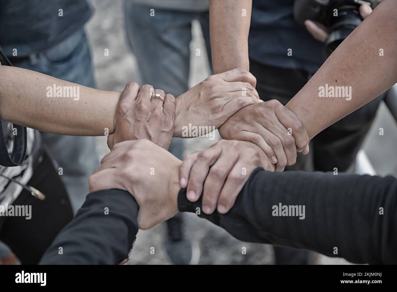 Professional young business people handsake, united, joining , combine ...