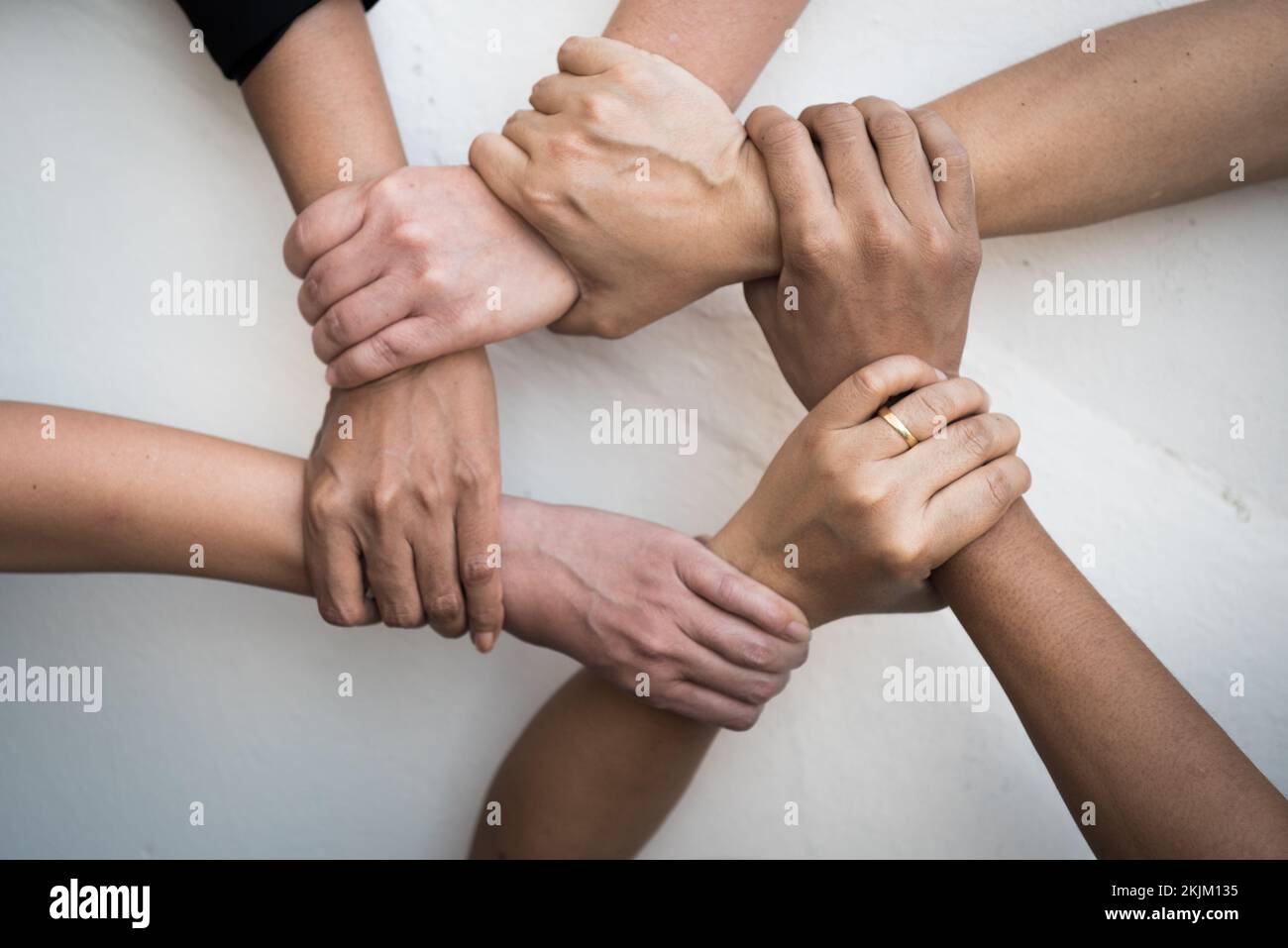 Professional young business people handsake, united, joining , combine ...