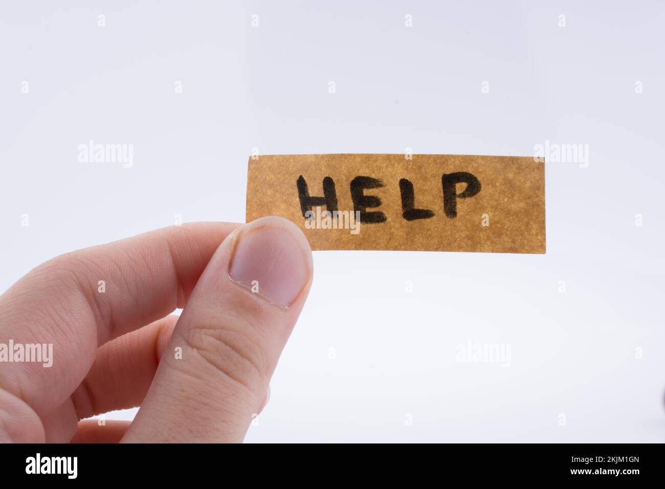 Paper piece word help hi-res stock photography and images - Alamy