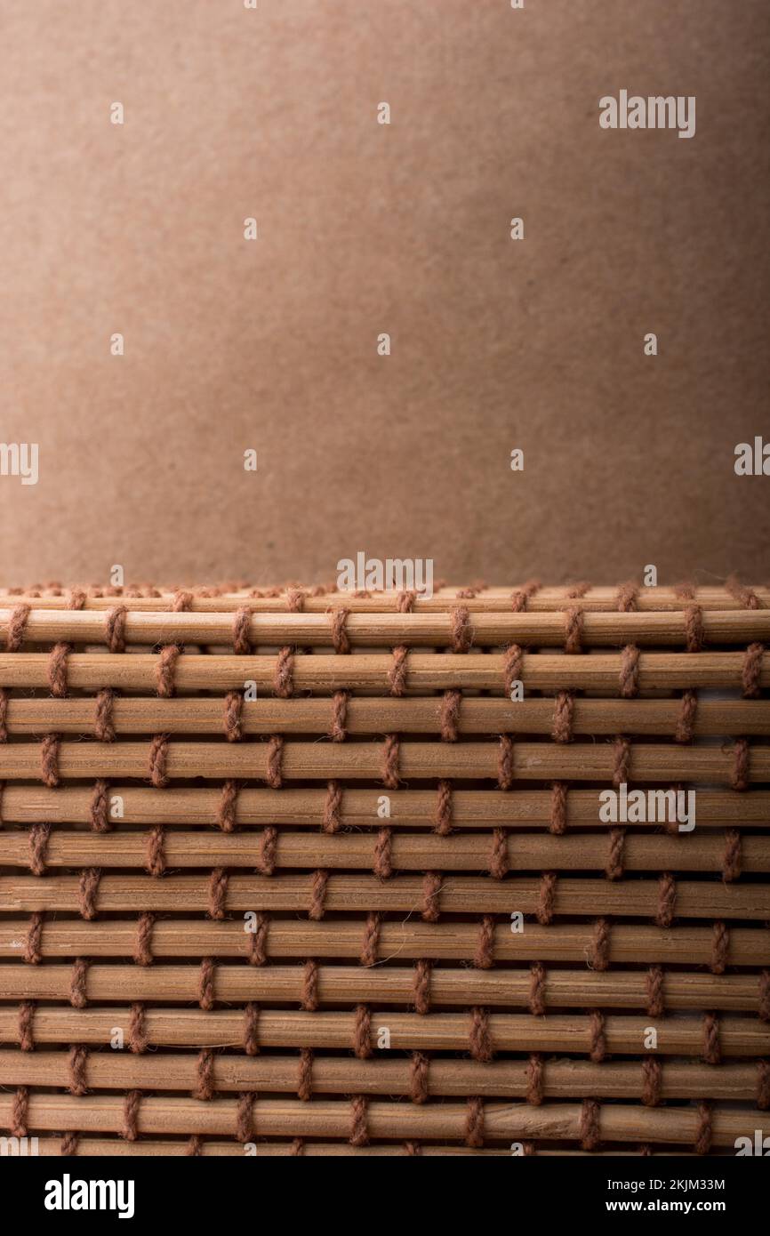 Straw mat and brown background for background usage Stock Photo - Alamy