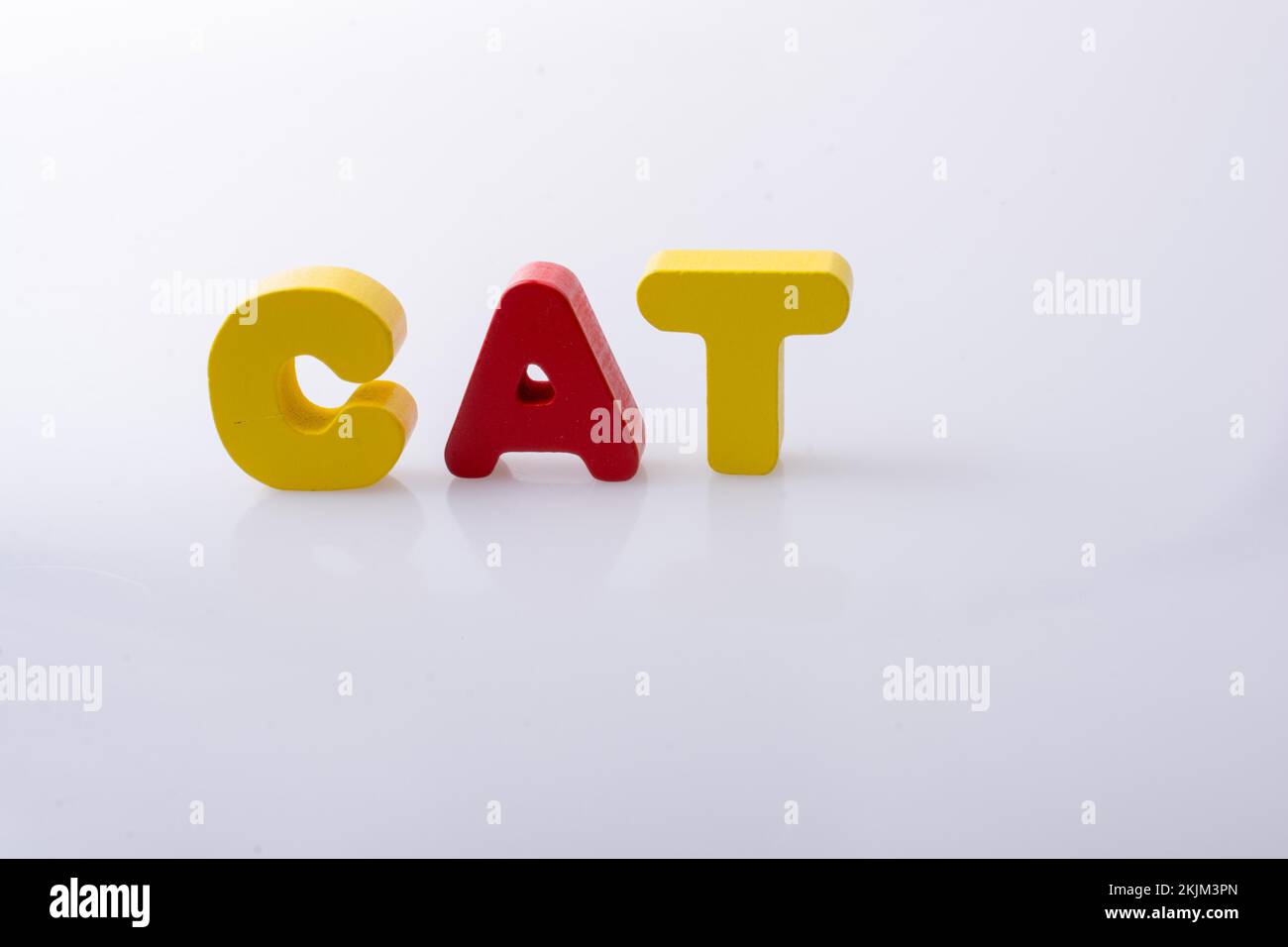 The word CAT written with colorful letter blocks Stock Photo - Alamy