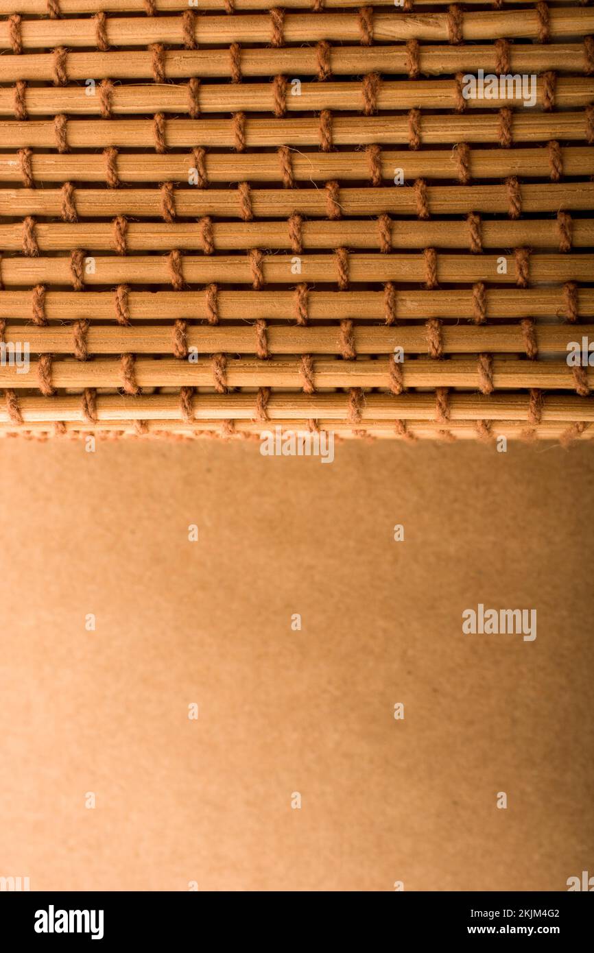 Straw mat and brown background for background usage Stock Photo - Alamy