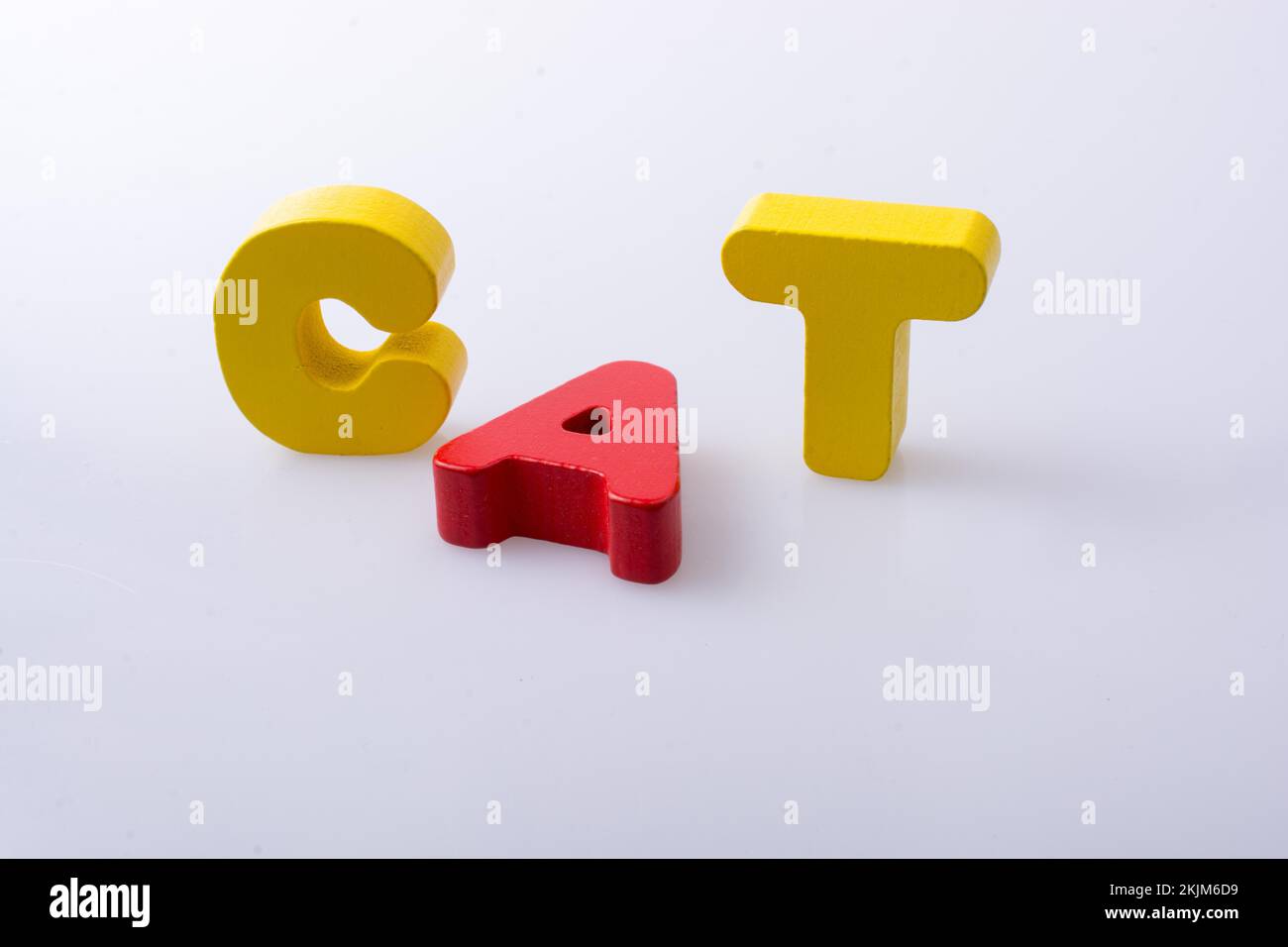 The word CAT written with colorful letter blocks Stock Photo - Alamy