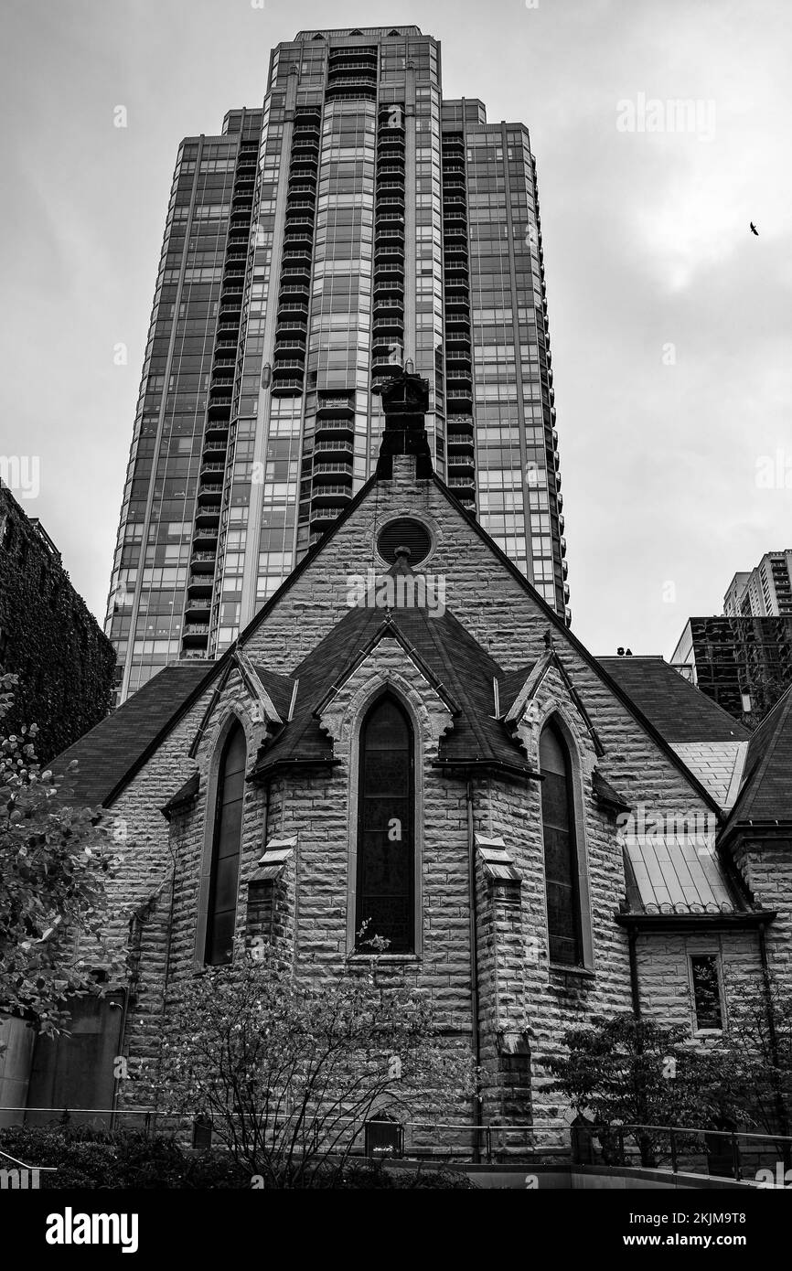 A vertical grayscale of the Saint James cathedral in Chicago captured ...