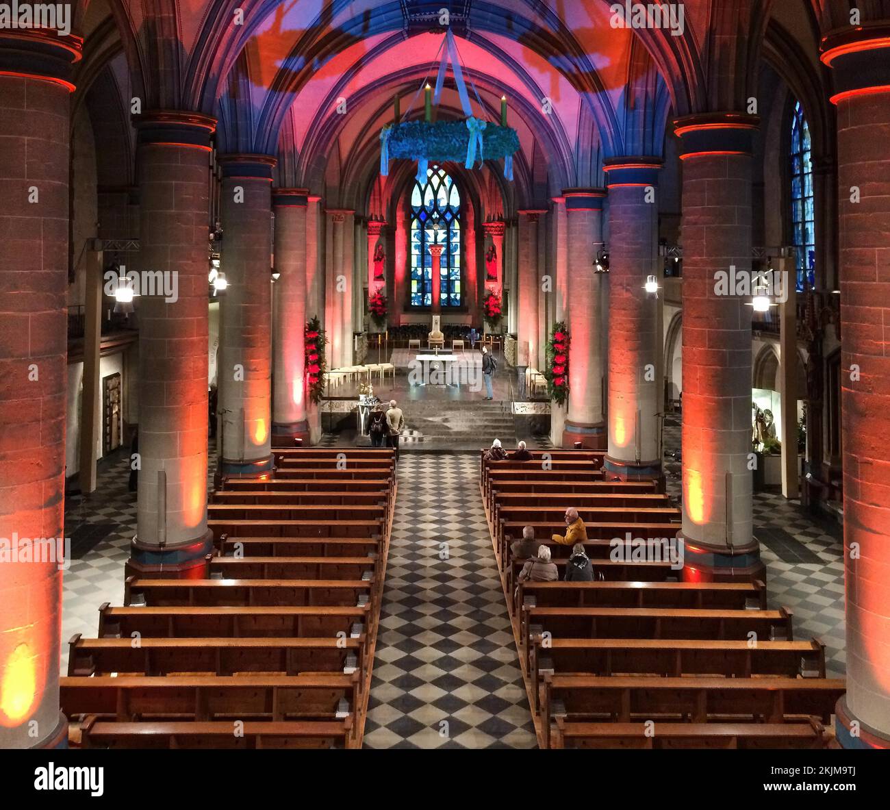 View from elevated position on festively lit interior central nave of ...