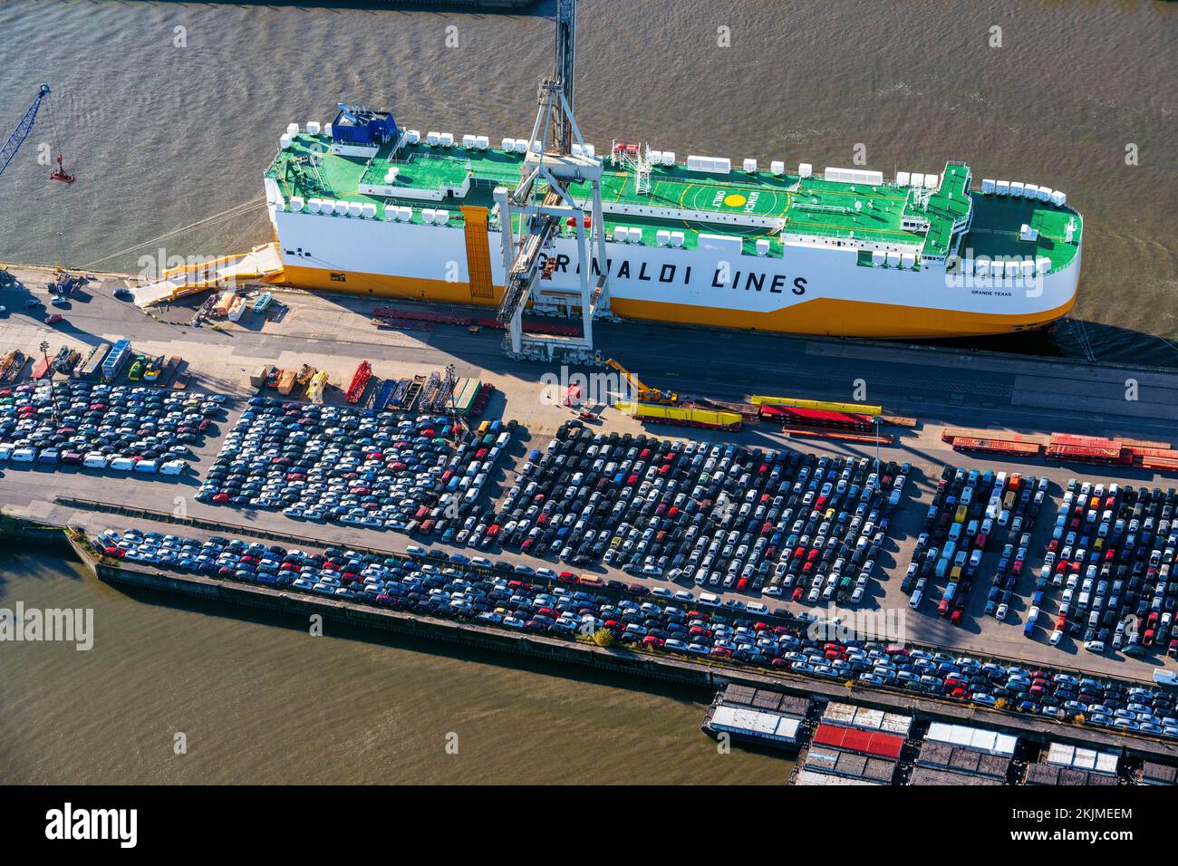 Grimaldi Lines at Unikai, old cars are loaded onto the ship, cargo ship ...