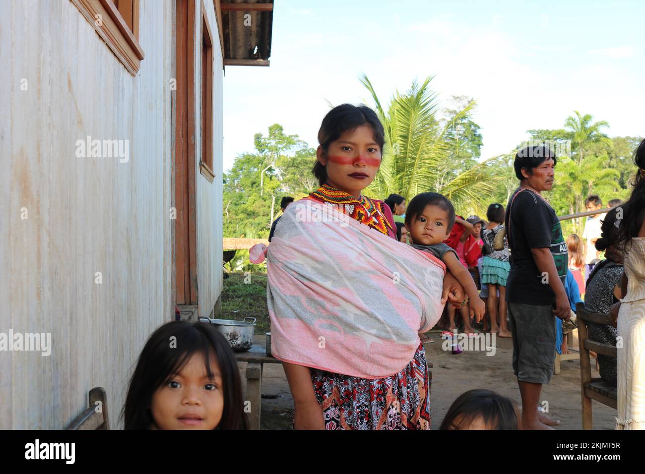Indigenous people, indigenous woman Huni Kuin carrying a baby in her ...