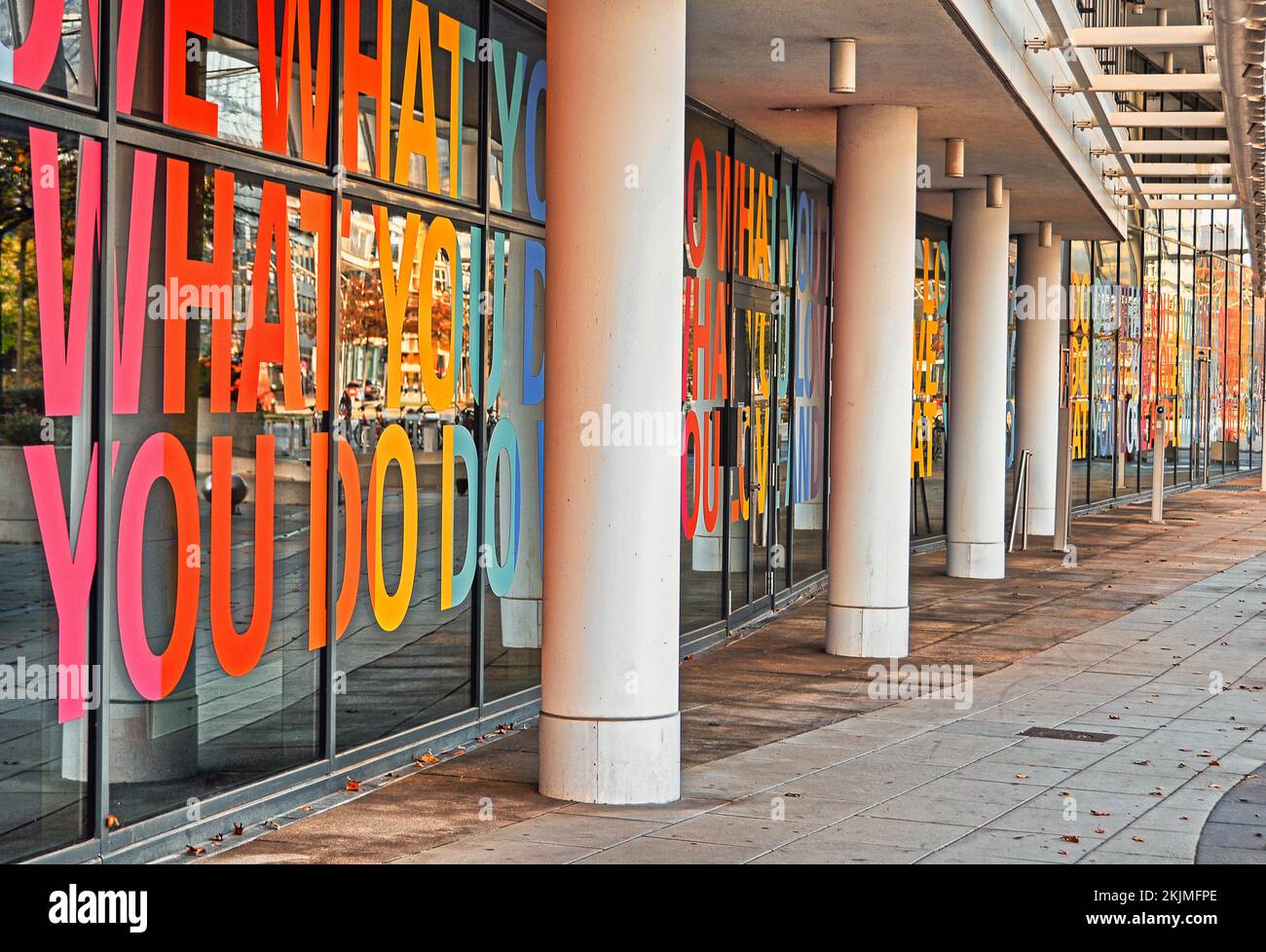 Colourful letters on a window front, white columns, Hafencity, Hamburg ...