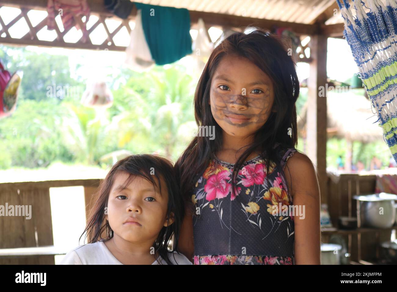 Indigenous people, girl and child of the Huni Kuin people in their ...
