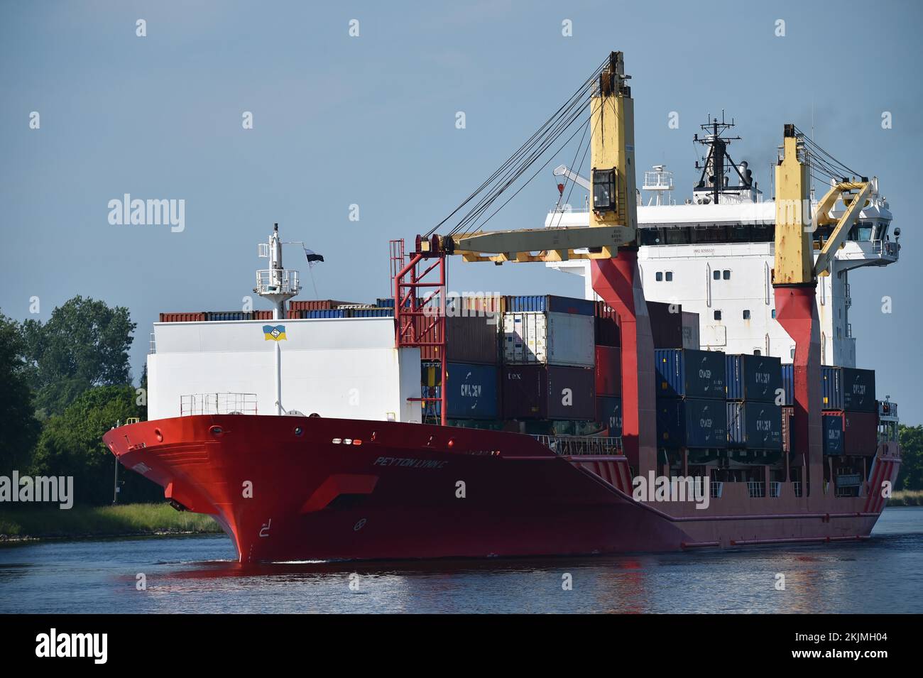 Container ship sailing through the Kiel Canal, Schleswig-Holstein ...