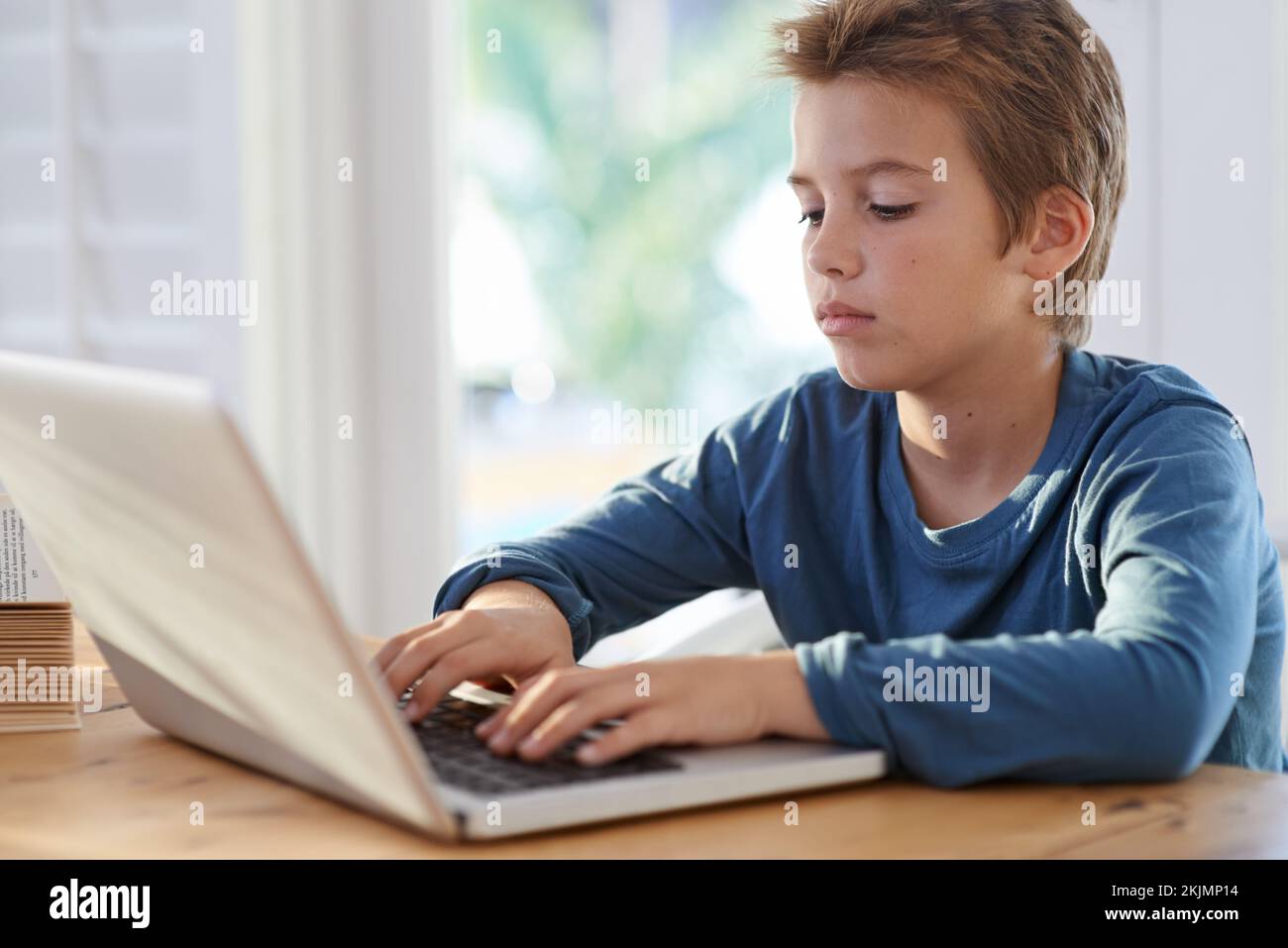 Boy school typing children hi-res stock photography and images - Alamy