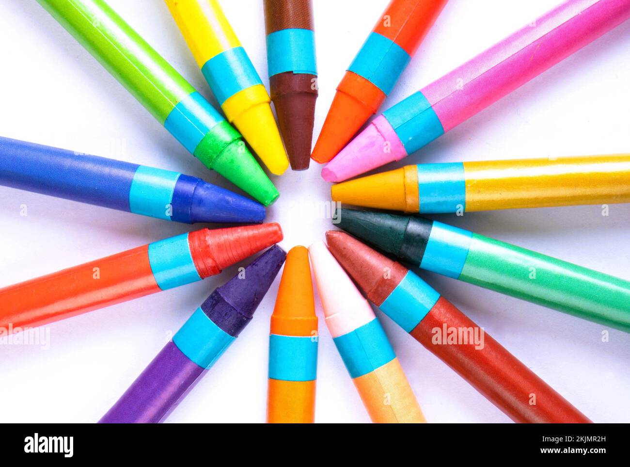 Rays of color wax crayons in a pattern Stock Photo - Alamy