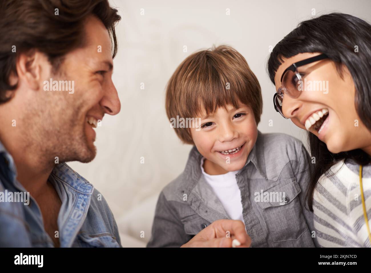 I couldnt ask for better parents. happy parents bonding with their son ...