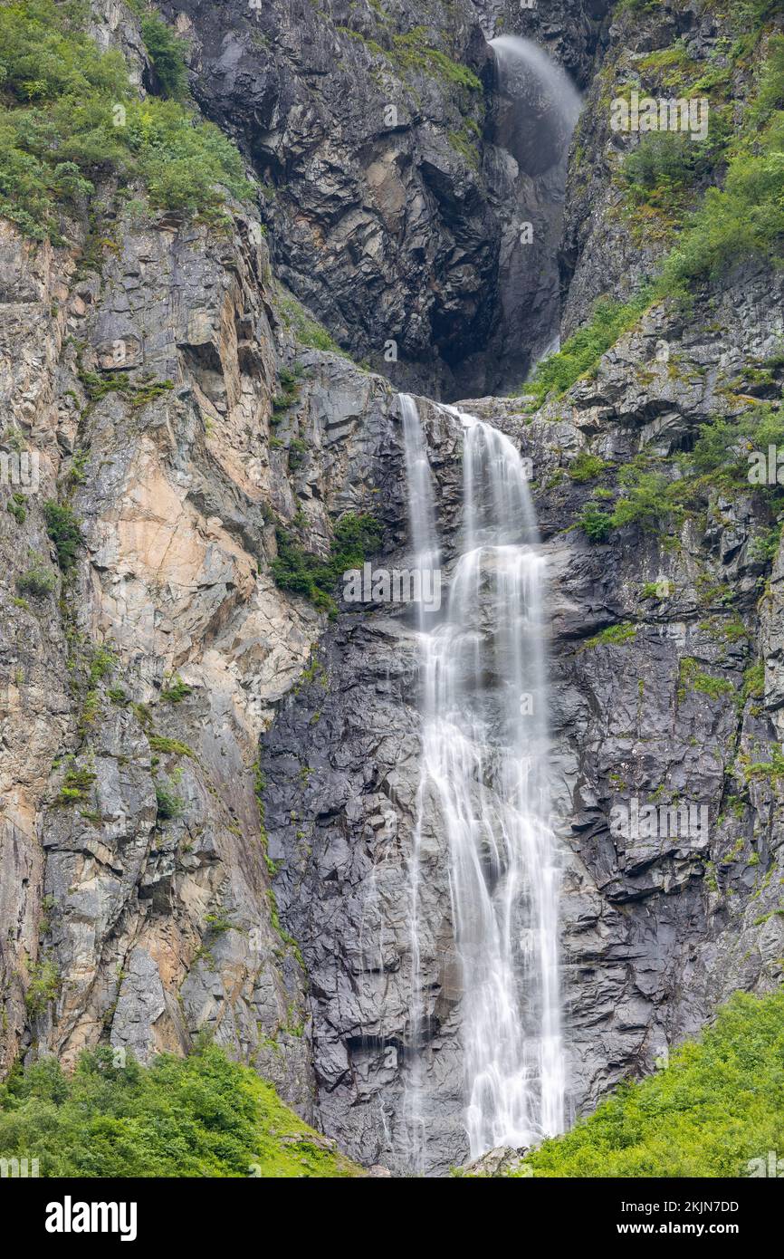 A waterfalls on a rocky cliffA bridge Stock Photo - Alamy