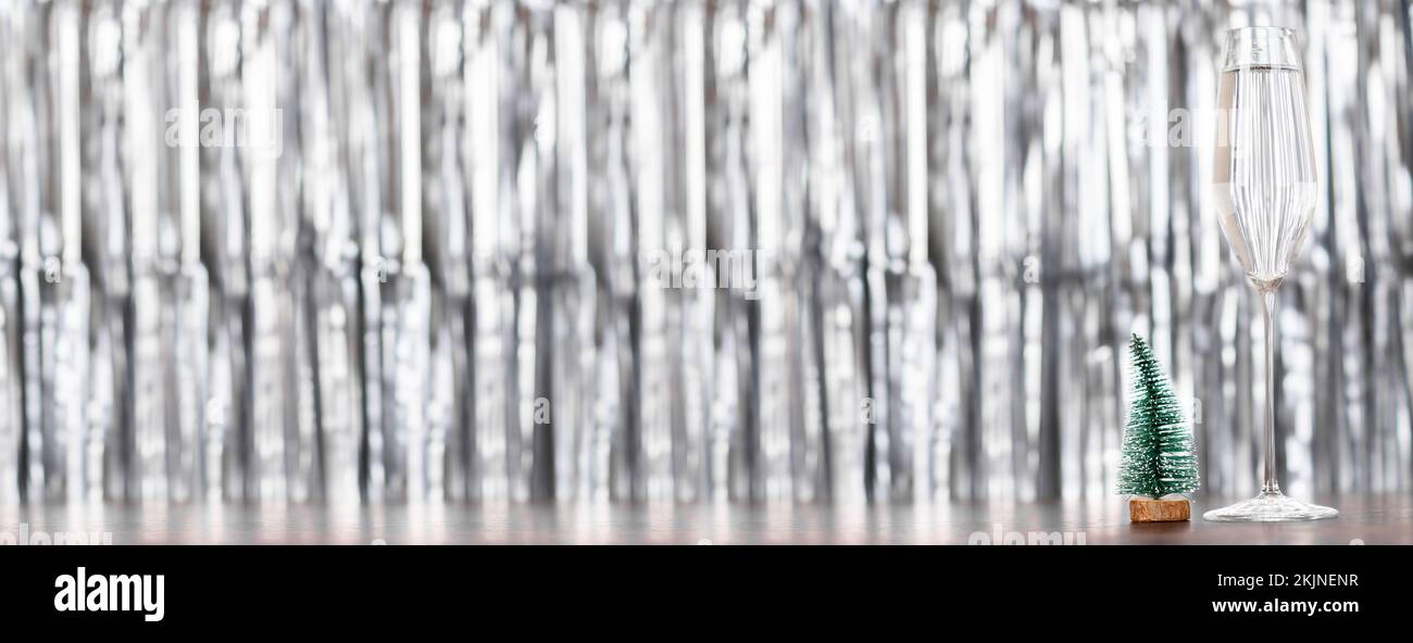 Christmas tree on silver background with copy space. Merry xmas and ...