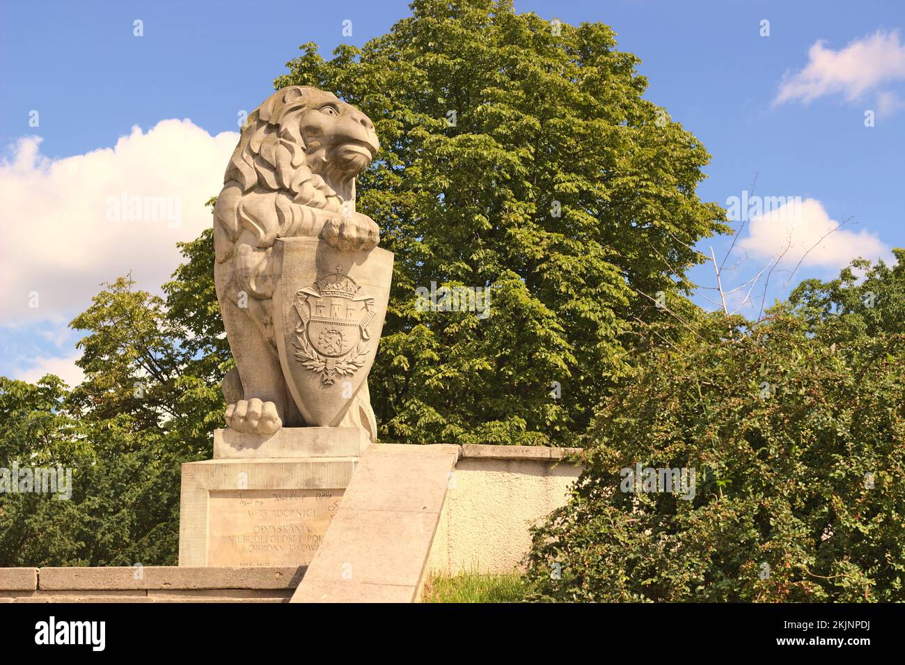 A lion statue "The Symbol of Lviv" holding a shield in Lublin Stock ...