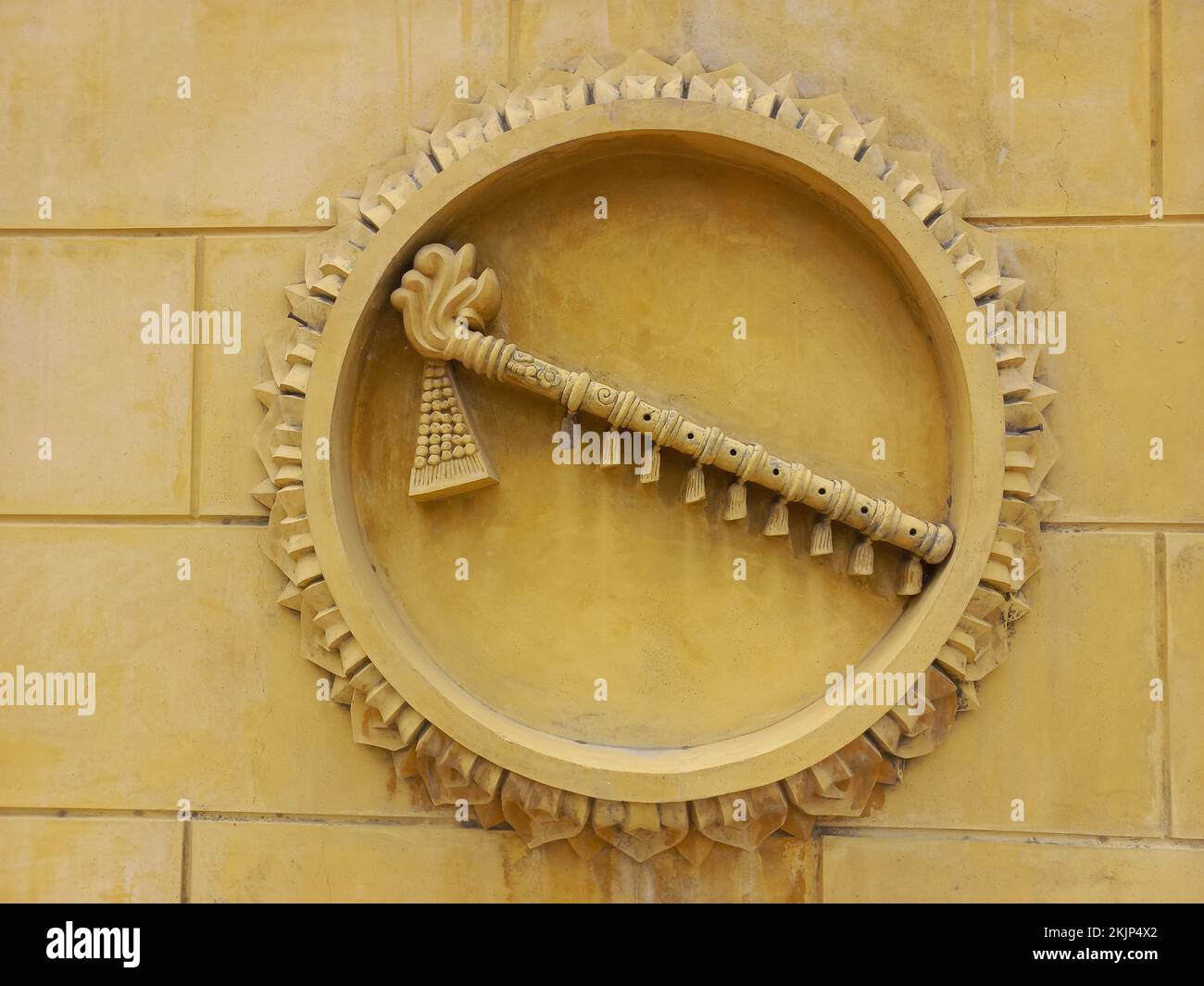 A Hindu Design Sculpture of flute of lord krishna inside a Circle in ...