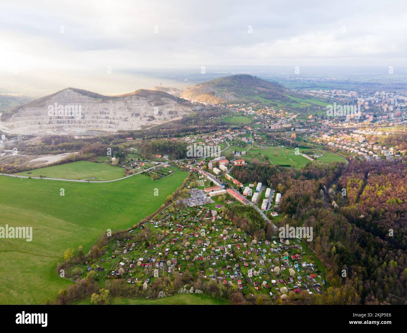 An aerial landscape of the Abandoned Stone Quarry with grass fields in Lestina, Czech Stock ...