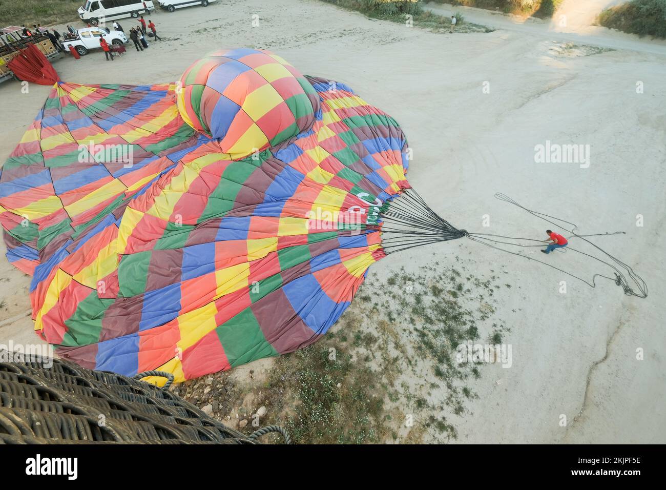 hot air ballon landing after over Cappadocia, Turkey Stock Photo - Alamy