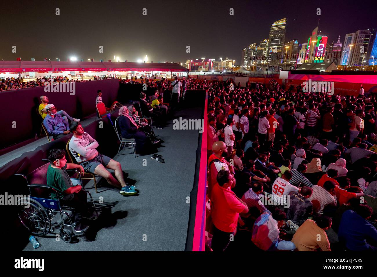 Football fans watch the match between Portugal and Ghana at the Fifa Fan Festival at Al Bidda ...