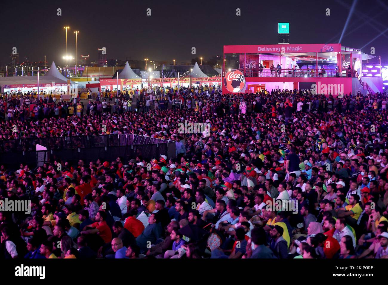 Football fans watch the match between Portugal and Ghana at the Fifa Fan Festival at Al Bidda ...