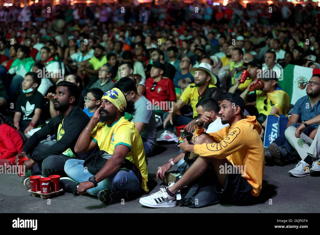Football fans watch the match between Portugal and Ghana at the Fifa Fan Festival at Al Bidda ...