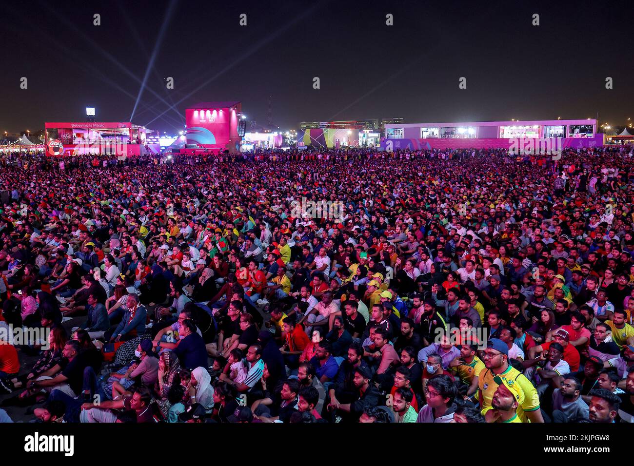 Football fans watch the match between Portugal and Ghana at the Fifa Fan Festival at Al Bidda ...