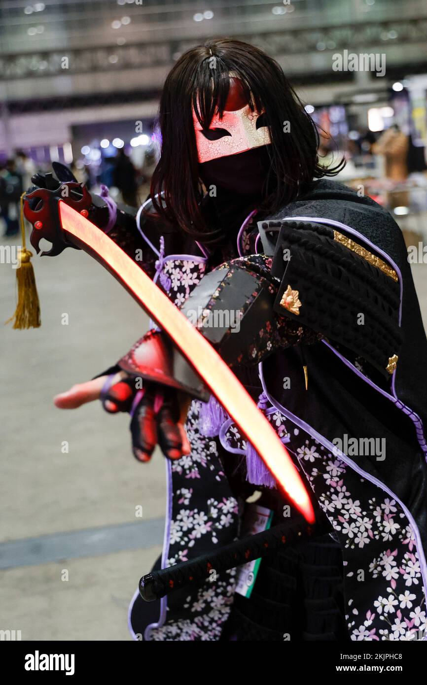 November 25, 2022, Chiba, Japan: A cosplayer poses for a photograph ...