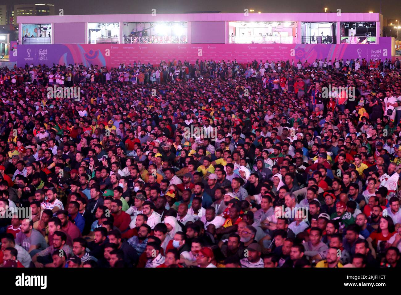 Football fans watch the match between Portugal and Ghana at the Fifa Fan Festival at Al Bidda ...