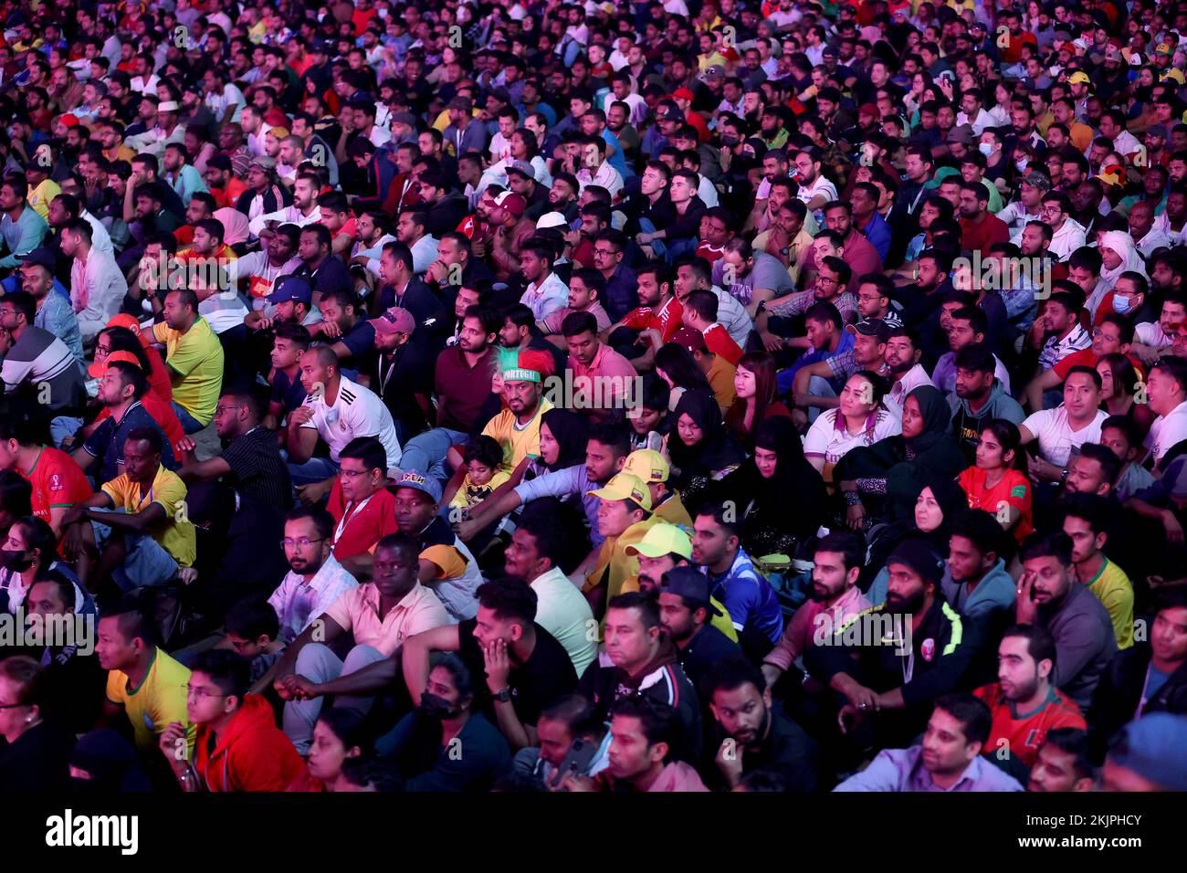 Football fans watch the match between Portugal and Ghana at the Fifa Fan Festival at Al Bidda ...