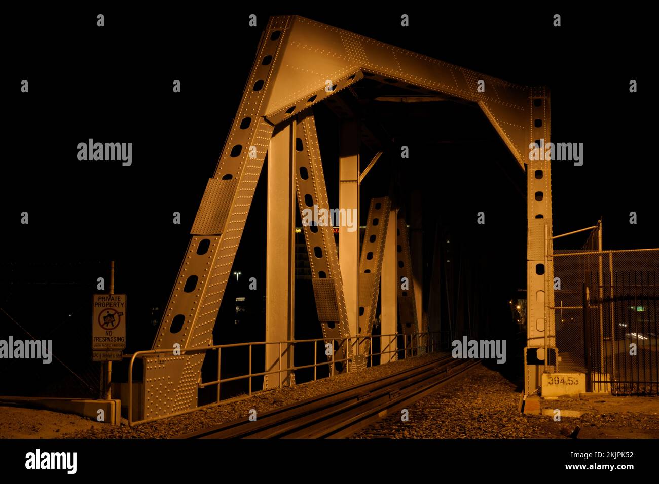 A view of the entrance to a railway bridge at night Stock Photo - Alamy