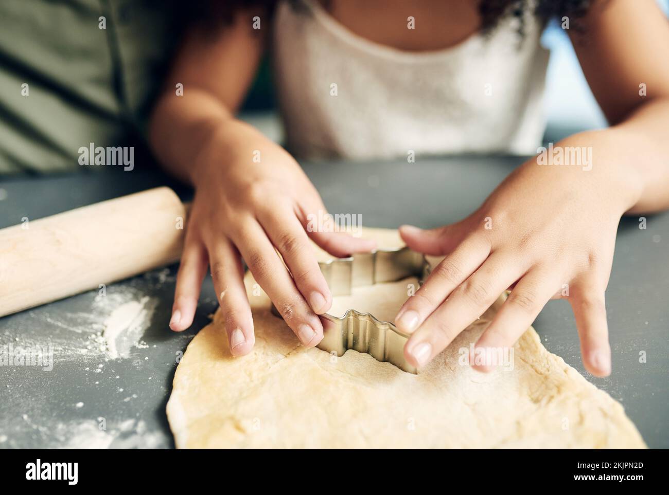 Family, hands baking and christmas tree cookies being made with a ...