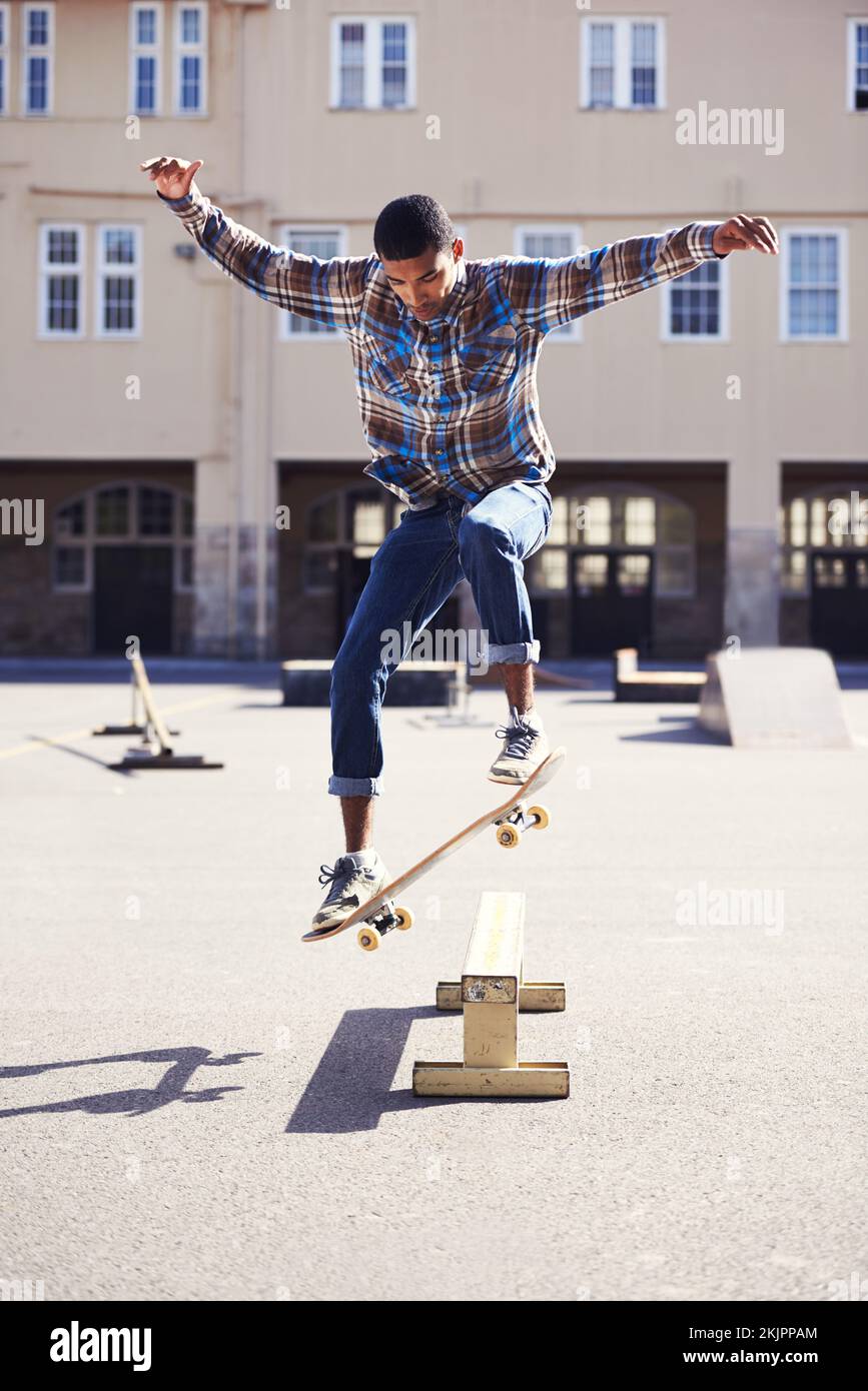 Cool young man skateboarding park hi-res stock photography and images ...