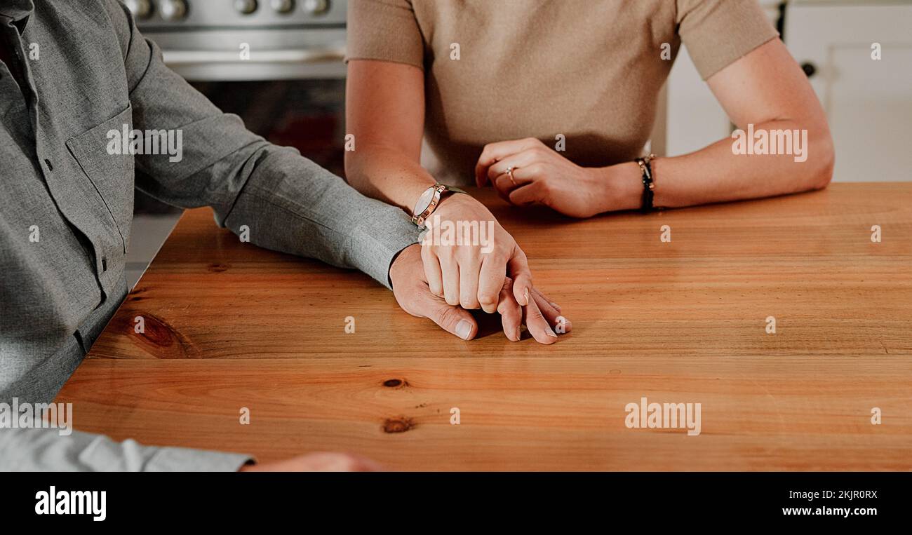 Support, holding hands and couple with marriage, home and mental health ...