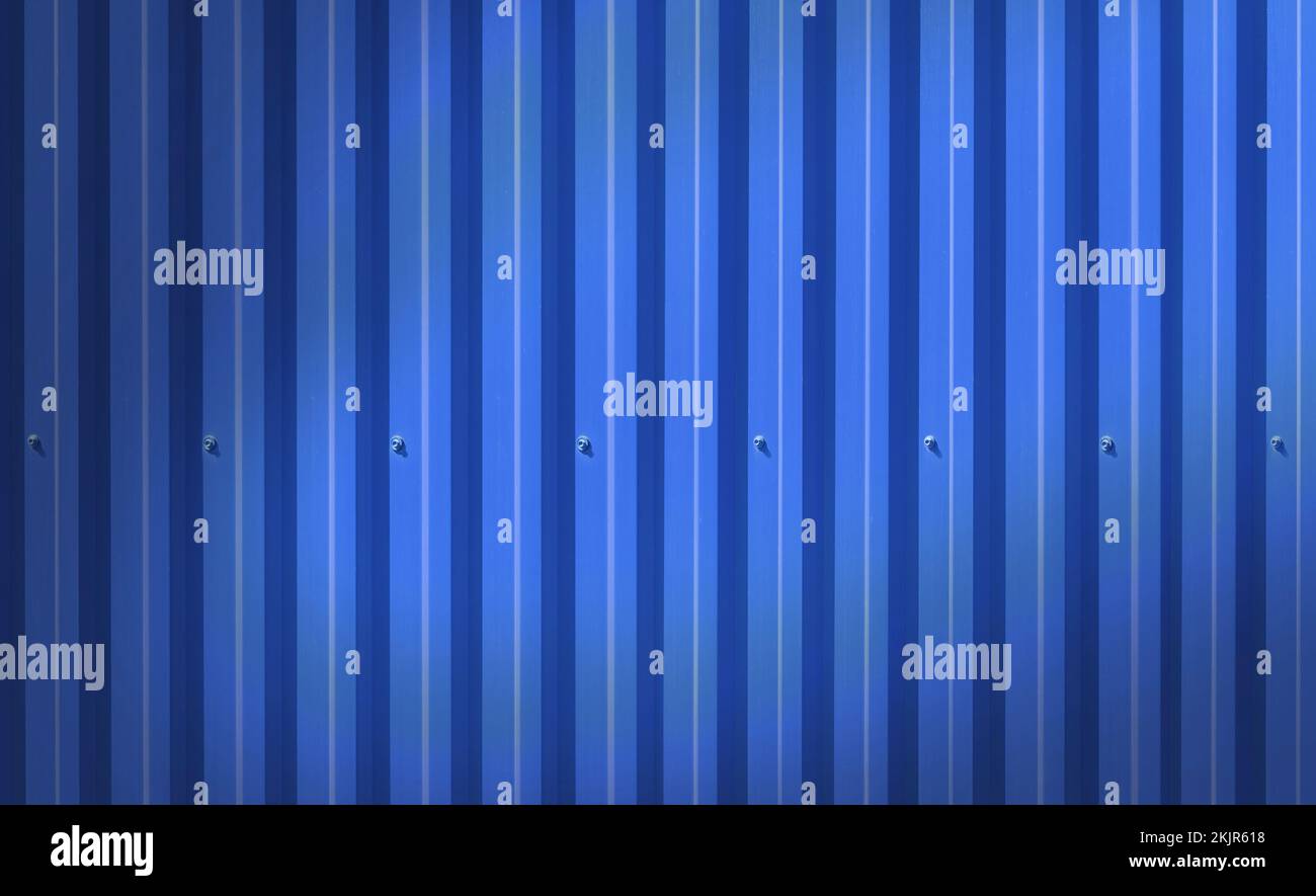 Fence made of metal panels a blue color outdoors Stock Photo - Alamy