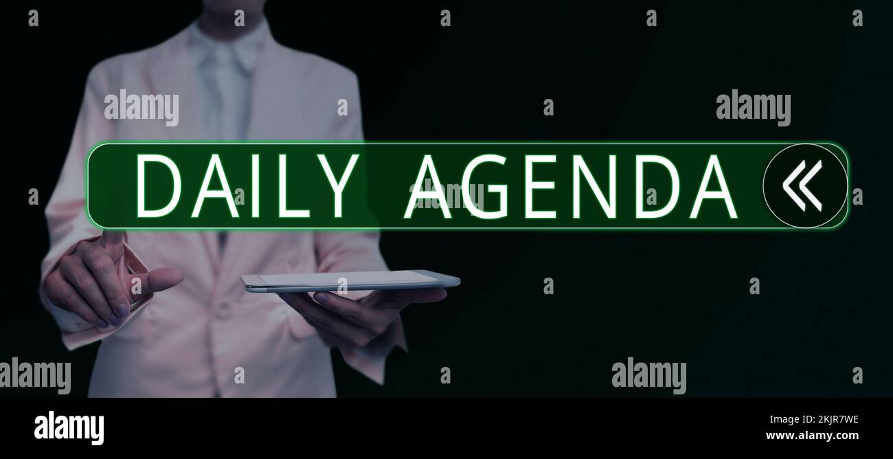 Sign displaying Daily Agenda. Word Written on To do list of items be ...