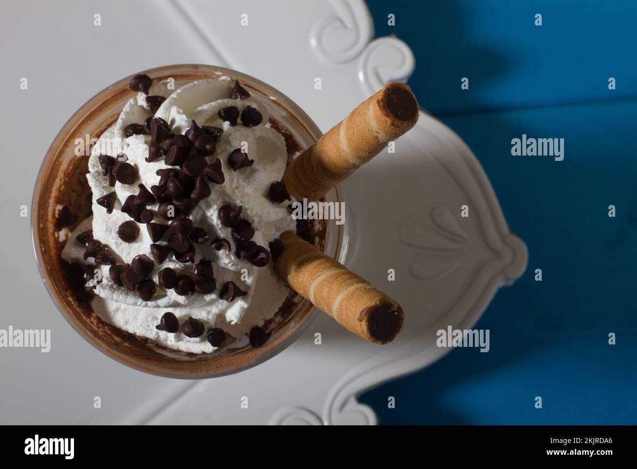 A top view of Frappe de chocolate Blanco ice cream on a white tray on ...
