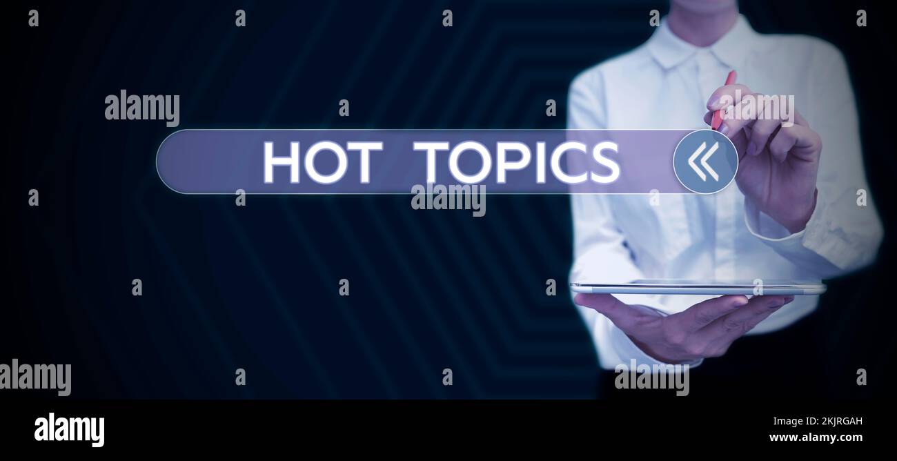 Hand writing sign Hot Topics. Business concept subject that a lot of ...
